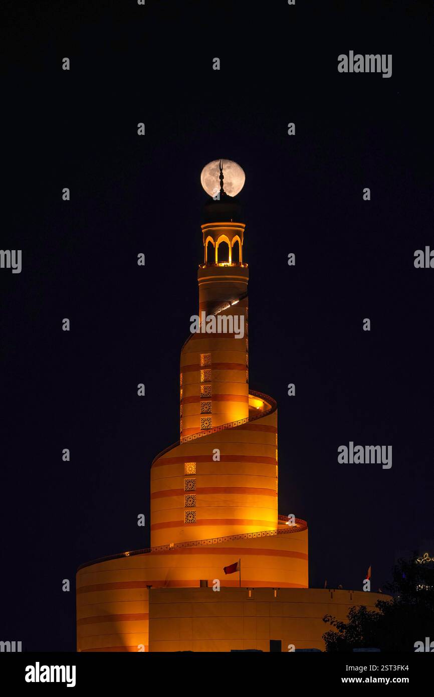 Fanar minaret Islamic cultural center Souq waqif with the full moon ...