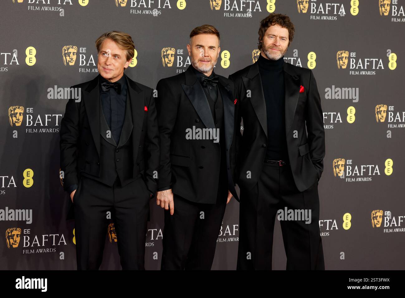 London, UK. 16th Feb, 2025. Mark Owen, Gary Barlow and Howard Donald of ...
