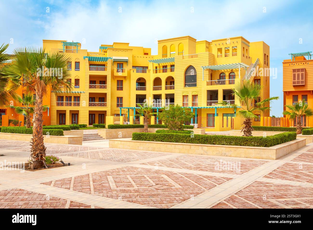 View of residential buildings surrounding new marina in El Gouna town ...