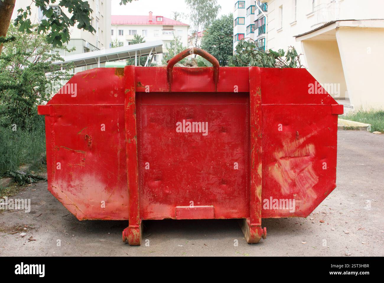 Red container with solid domestic and construction waste Stock Photo ...