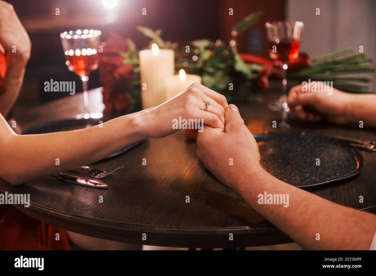 Close up. Romantic couple have dinner in the restaurant Stock Photo - Alamy