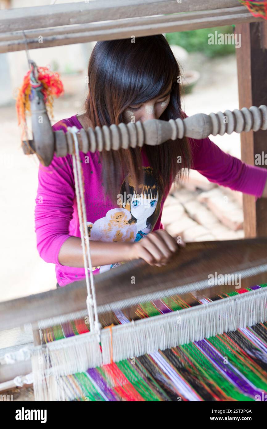 Myanmar, Bagan, young woman weaving Stock Photo - Alamy