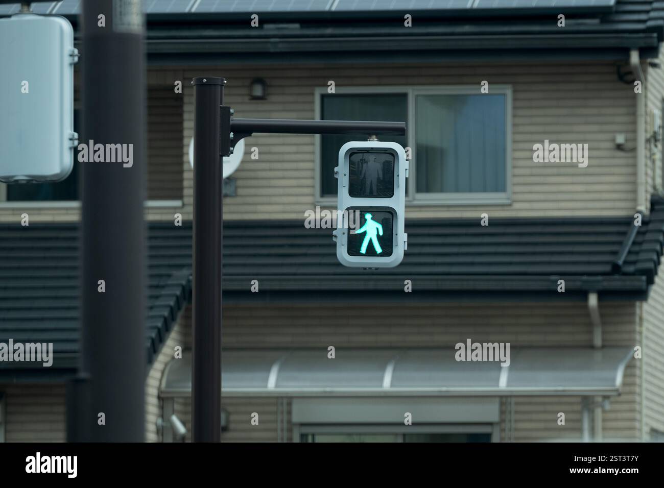 Pedestrian crossing light tells pedestrians safe to cross the street in ...