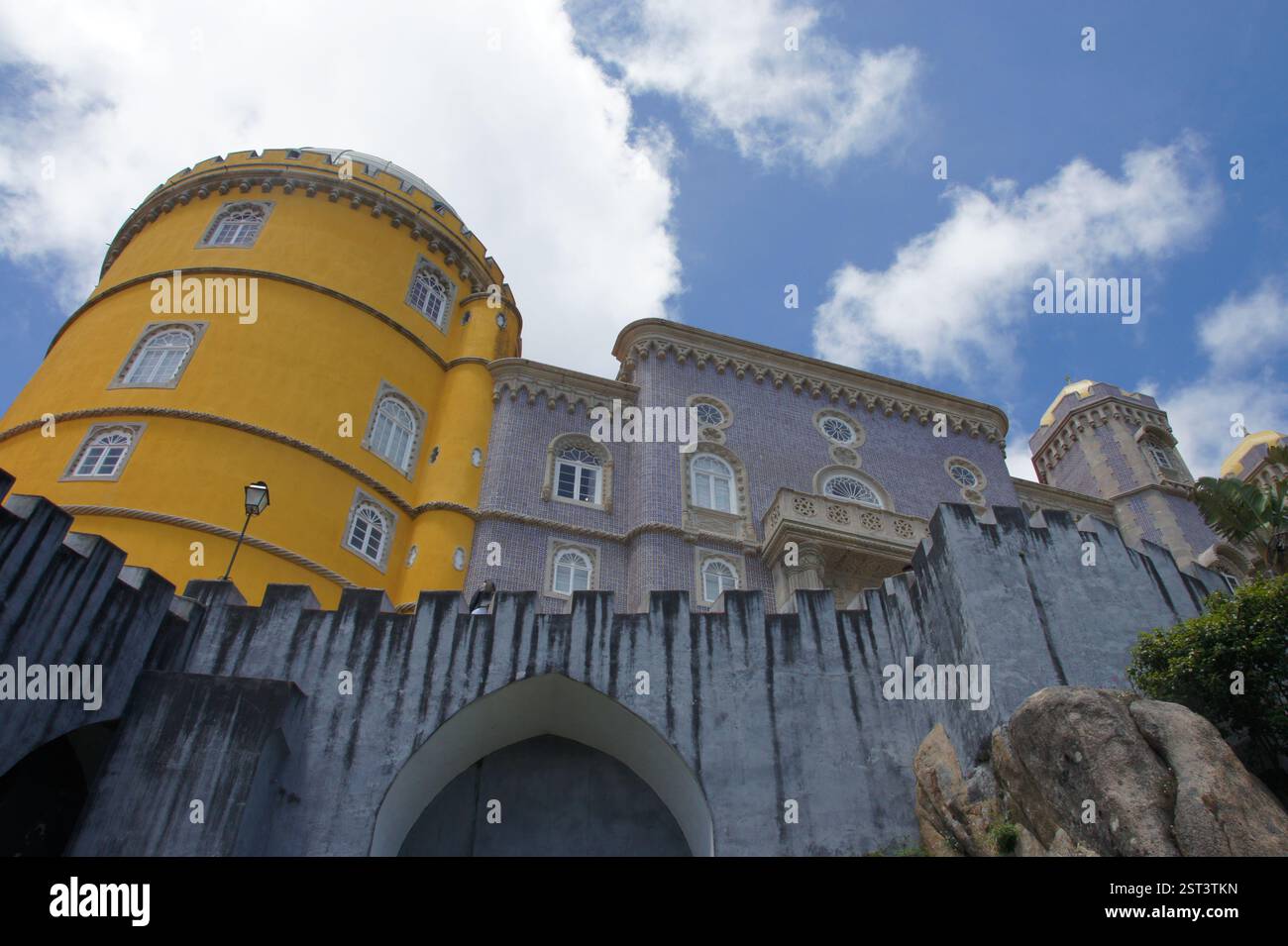 Pena Palace, Sintra, Portugal. A vibrant yellow and purple castle ...