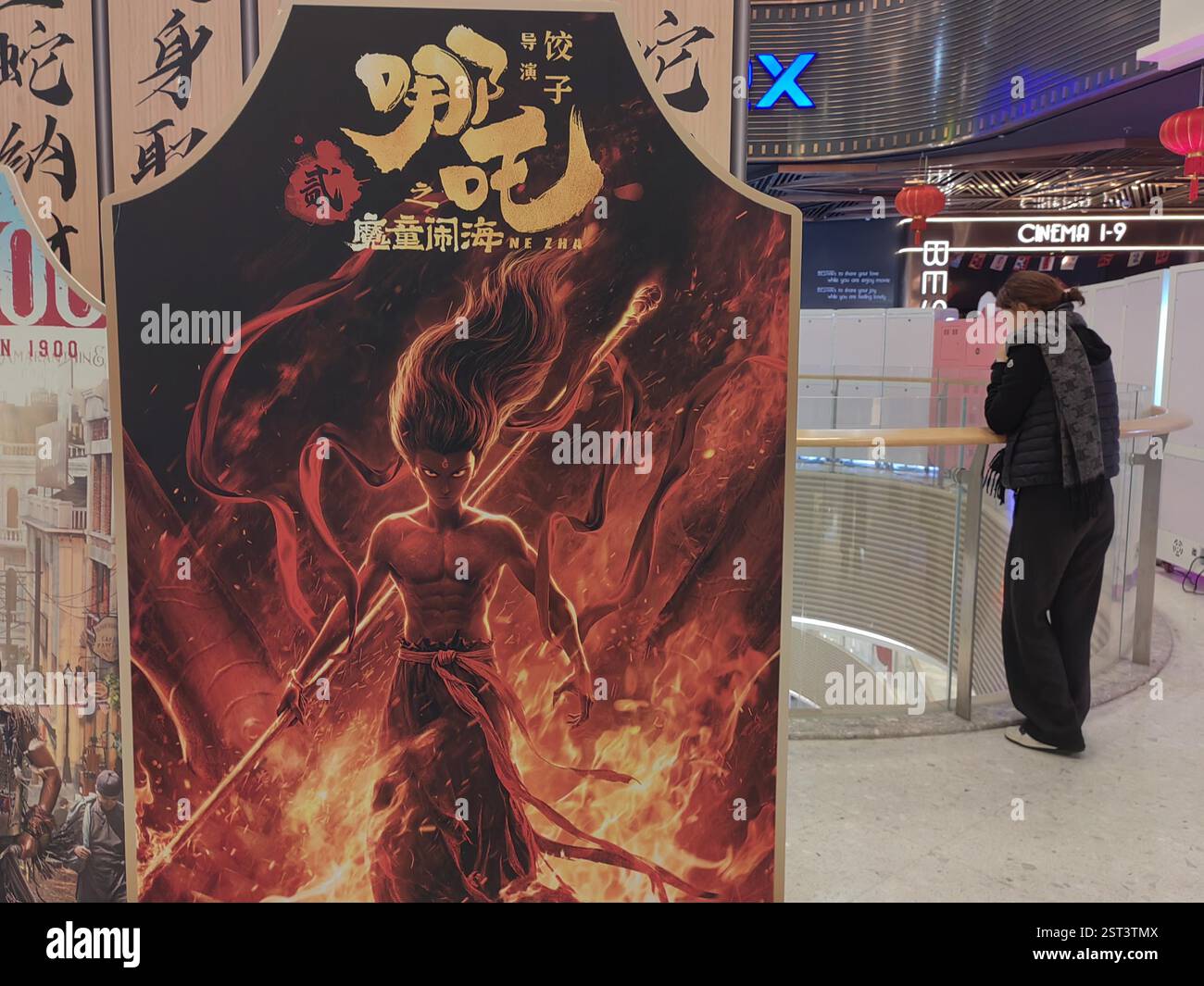 Photo shows a poster for the Chinese animated film Ne Zha 2 at a cinema ...