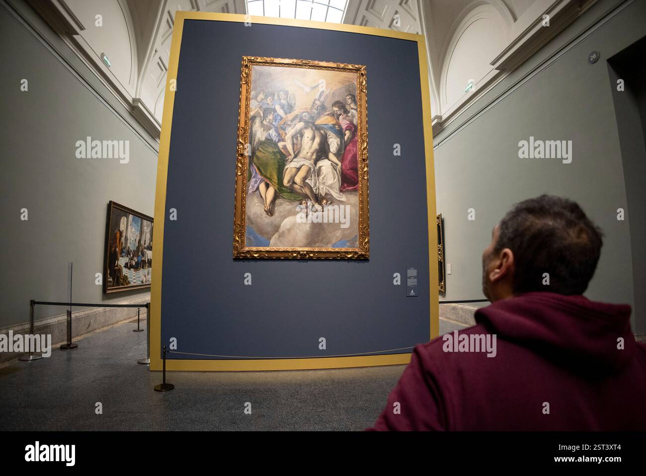 A visitor contemplates the work 'The Trinity' by El Greco at the ...