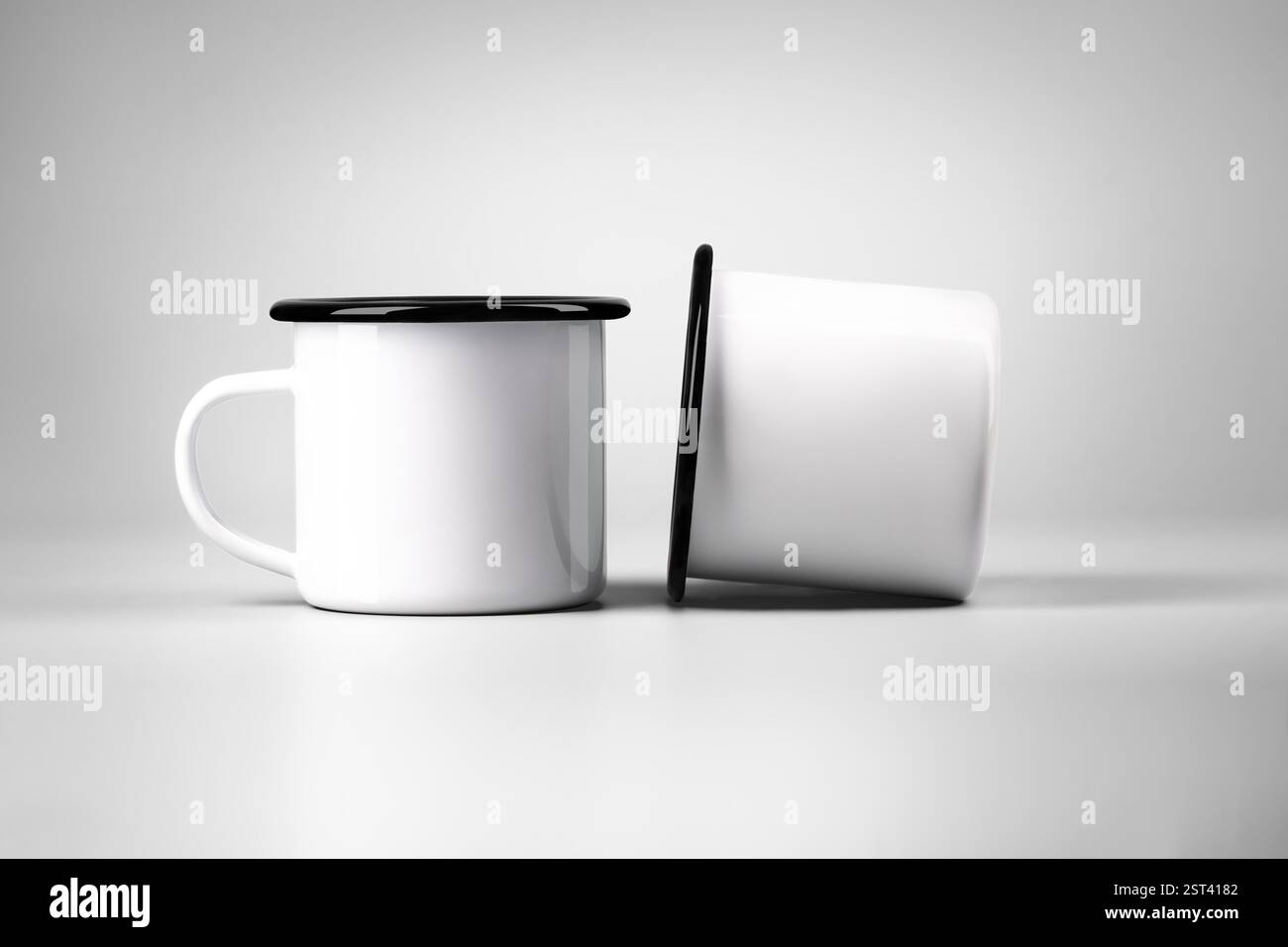 Template of enamel white mugs with black rim, composition of metal cups ...