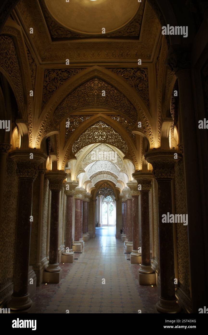Long corridor, ornate arches, columns. Moorish-inspired architecture, Sintra, Portugal. Palace ...