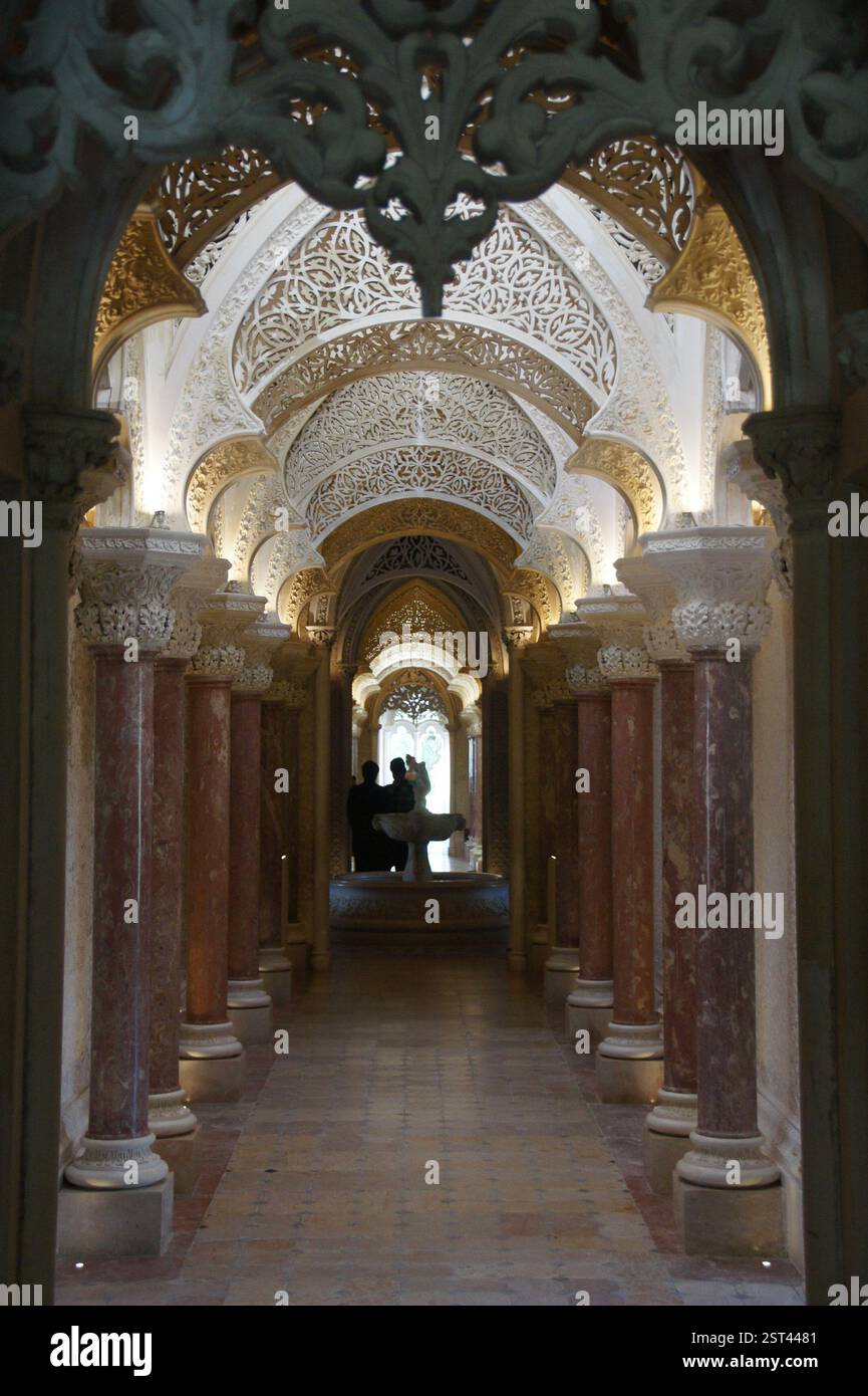 Interior corridor. Ornate arches and columns. Moorish architecture, Sintra, Portugal. A ...