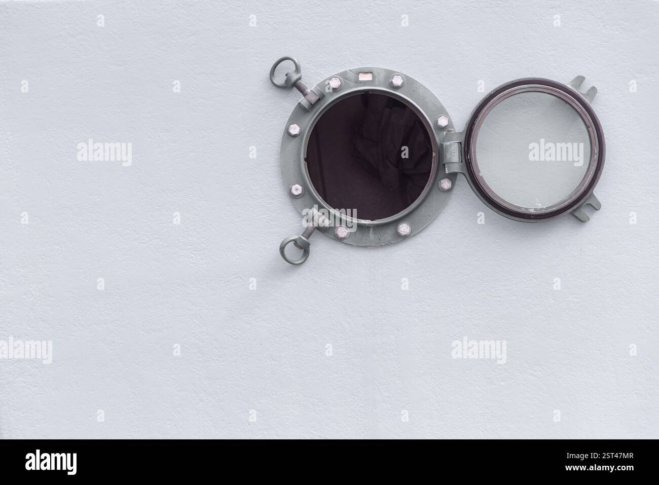 Minimal open porthole on a white boat vintage Stock Photo - Alamy