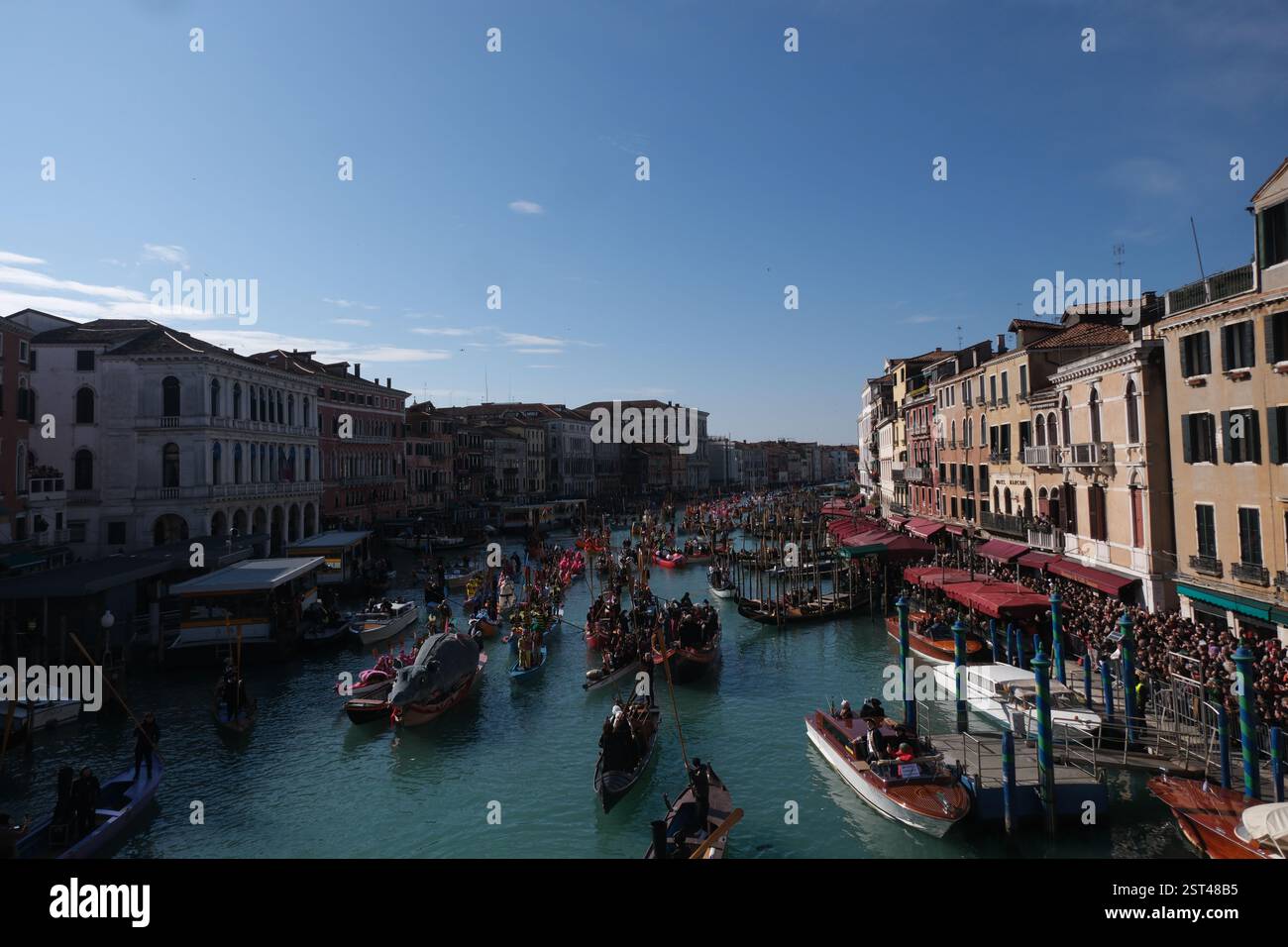 People rowing in a masquerade parade during Venice Carnival Stock Photo ...