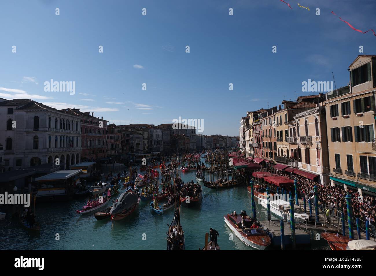 People rowing in a masquerade parade during Venice Carnival Stock Photo ...