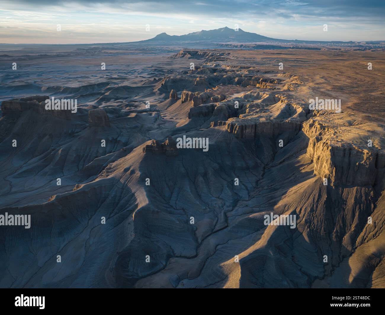 Aerial View of Rugged Desert Badlands with Dramatic Shadows Stock Photo ...