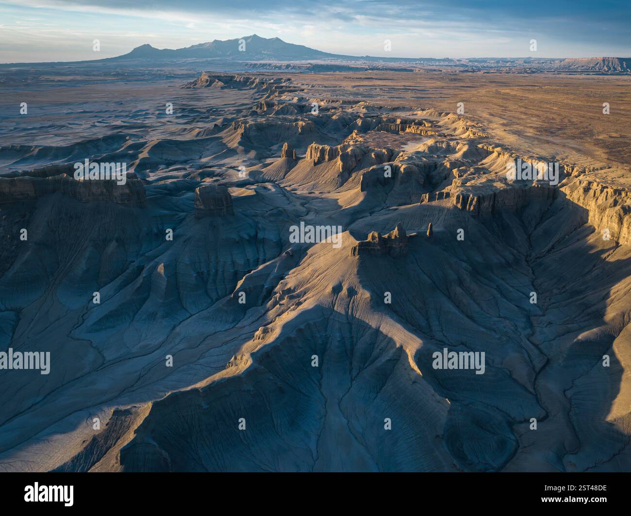 Aerial View of Rugged Desert Badlands with Dramatic Shadows Stock Photo - Alamy
