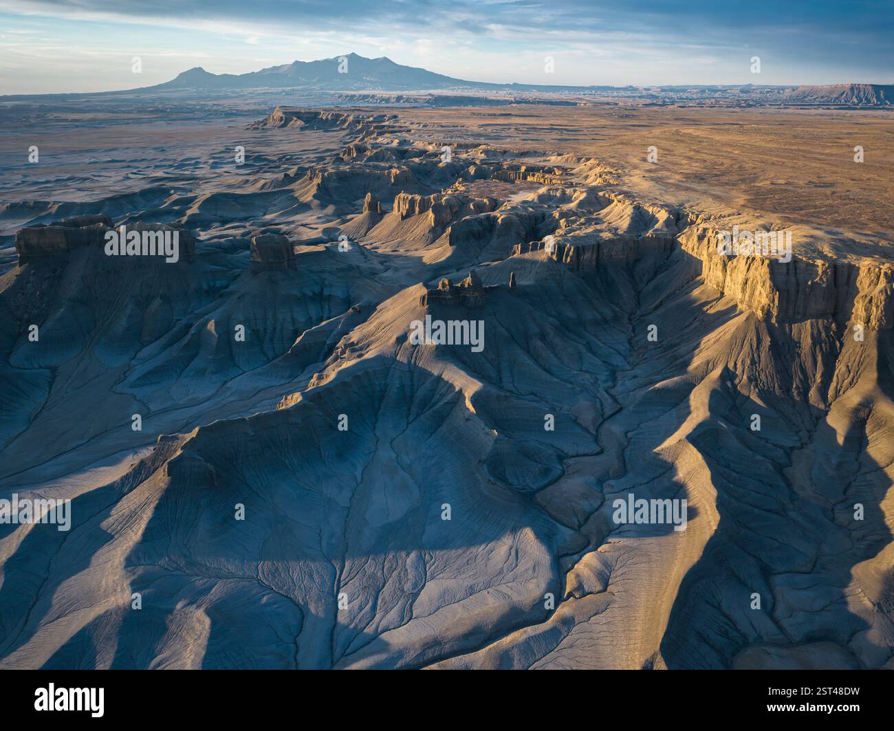 Aerial View of Rugged Desert Badlands with Dramatic Shadows Stock Photo - Alamy