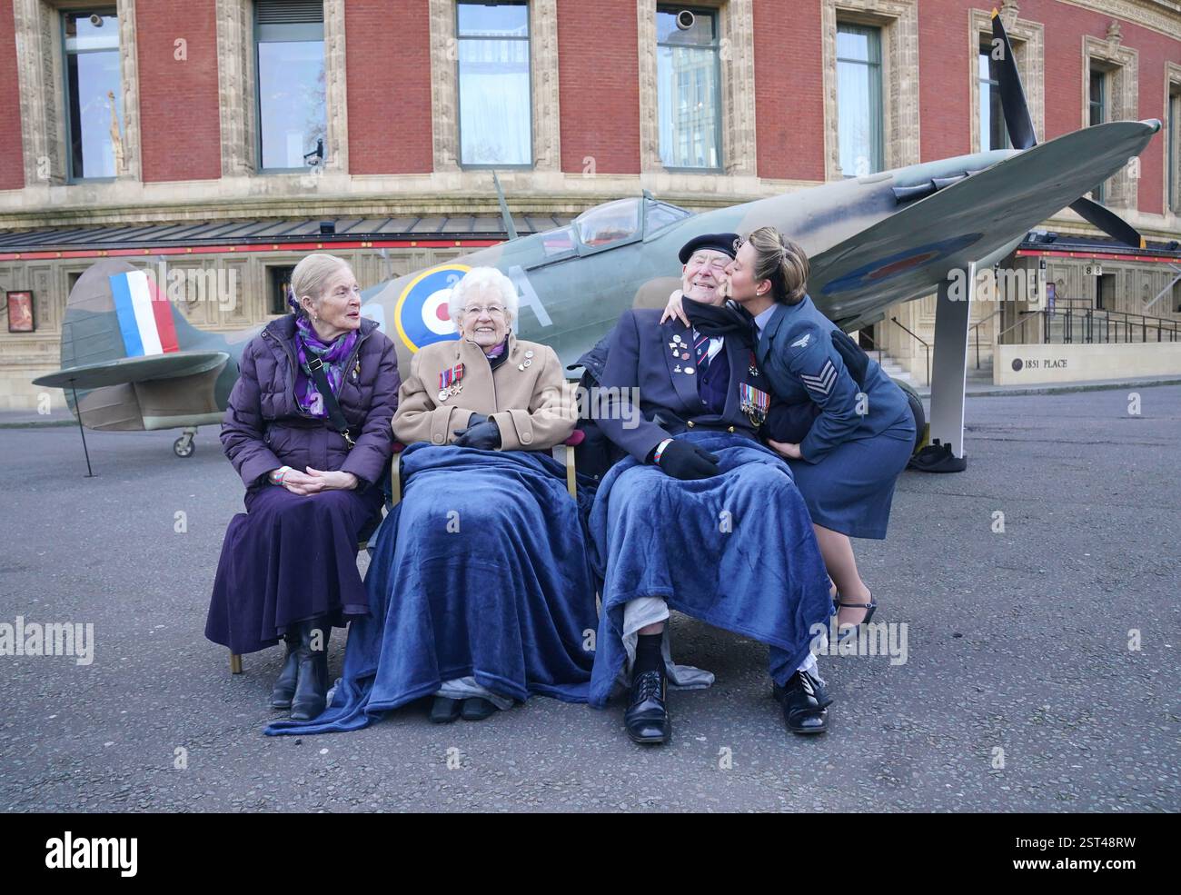 (left to right) Dorren Simson, 87, an evacuee from White City during ...
