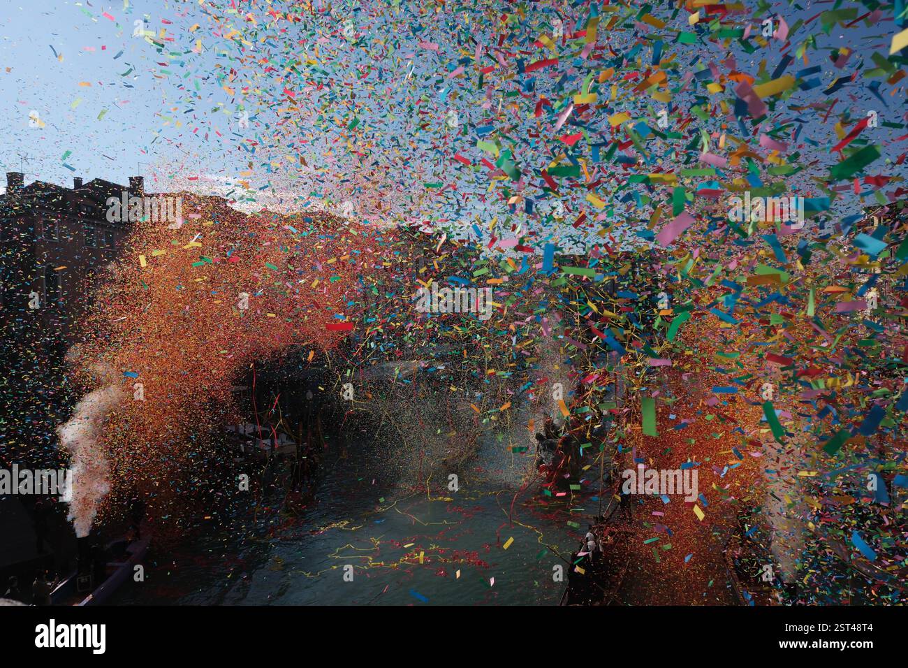 People rowing in a masquerade parade during Venice Carnival Stock Photo ...