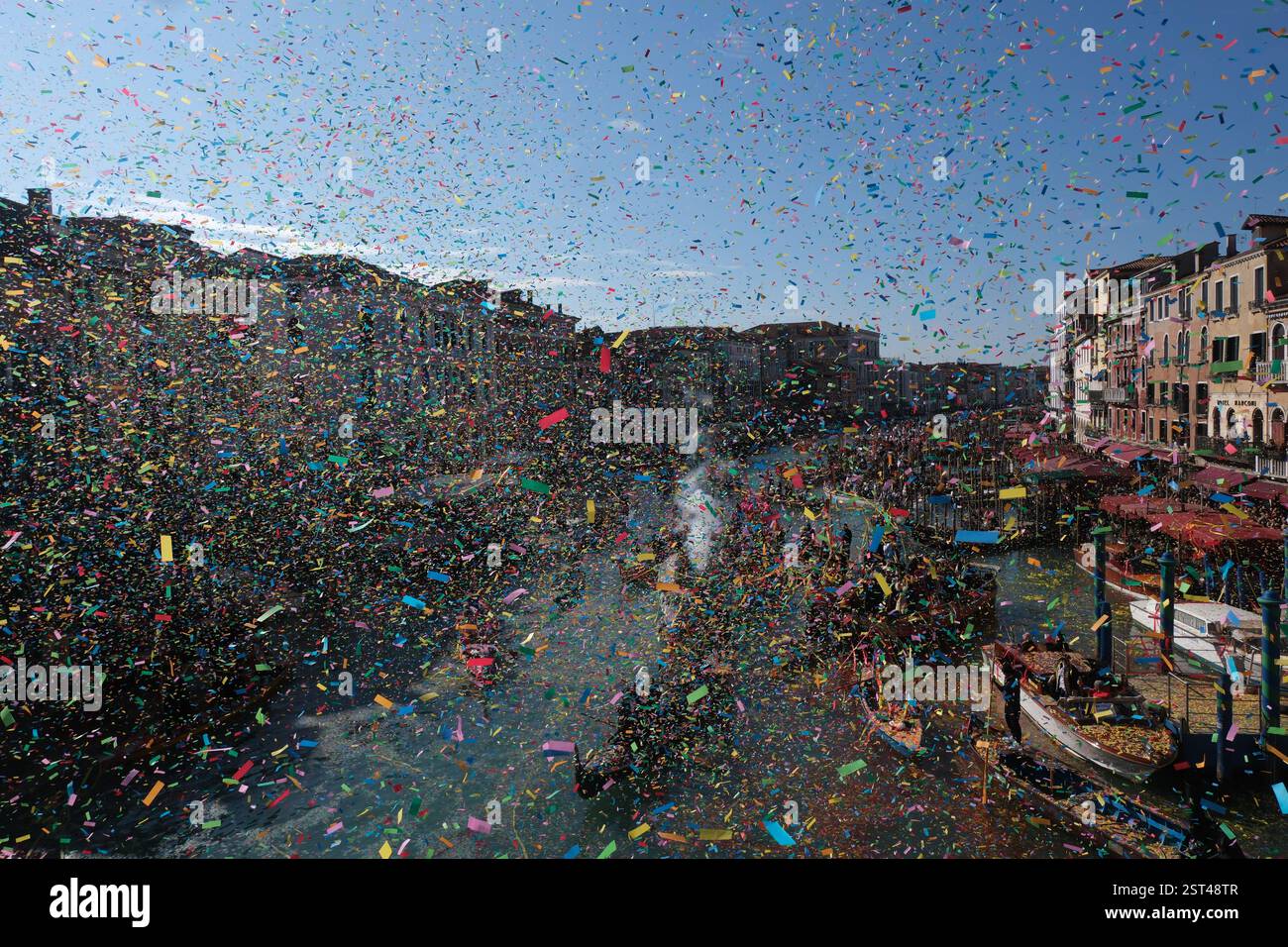 People rowing in a masquerade parade during Venice Carnival Stock Photo ...