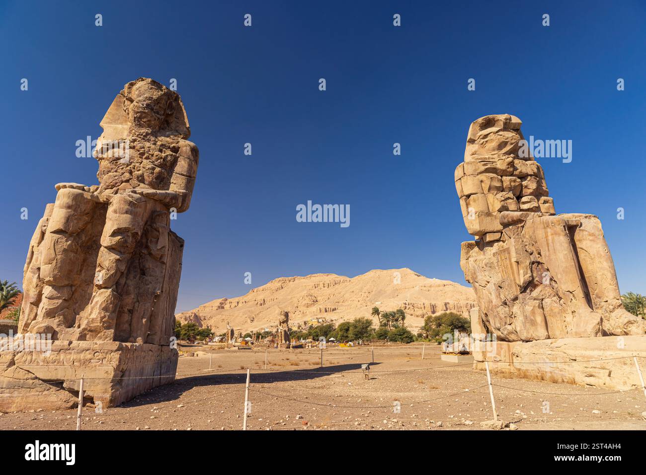 Famous two Colossi of Memnon near Luxor, Egypt Stock Photo - Alamy