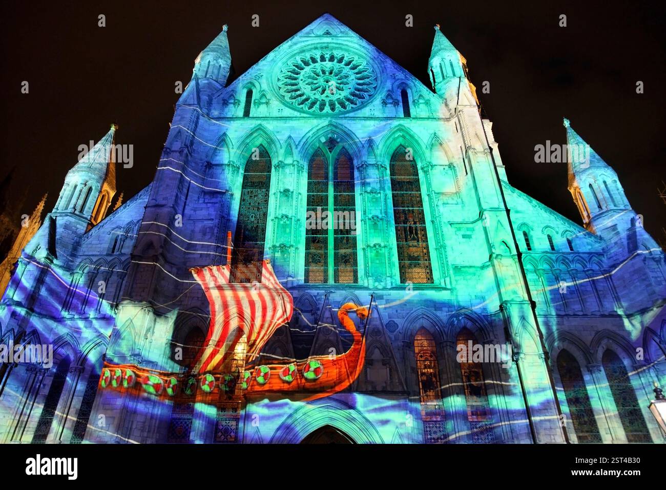 The South Transept of York Minster, UK, illuminated by the "Colour and Light" display with a ...