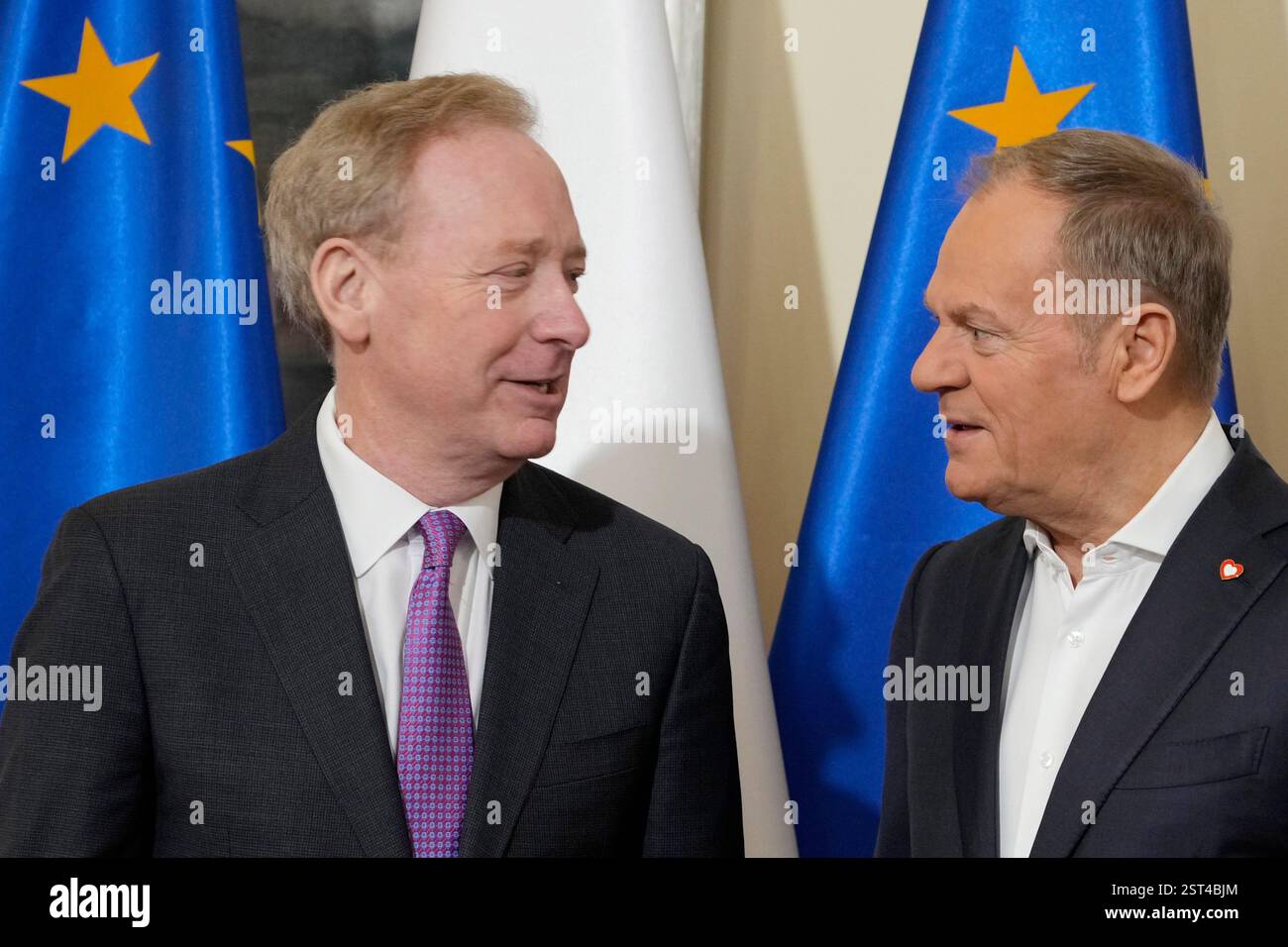 Microsoft's Vice Chair and President Brad Smith, left, and Poland's ...