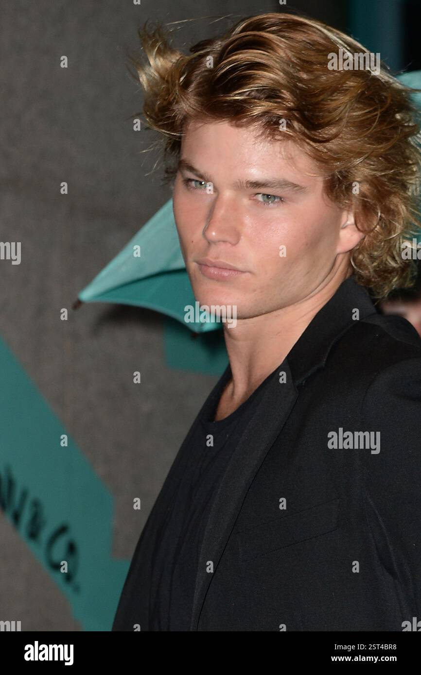 Jordan Barrett attending Tiffany & Co. 'Paper Flowers' jewelry ...