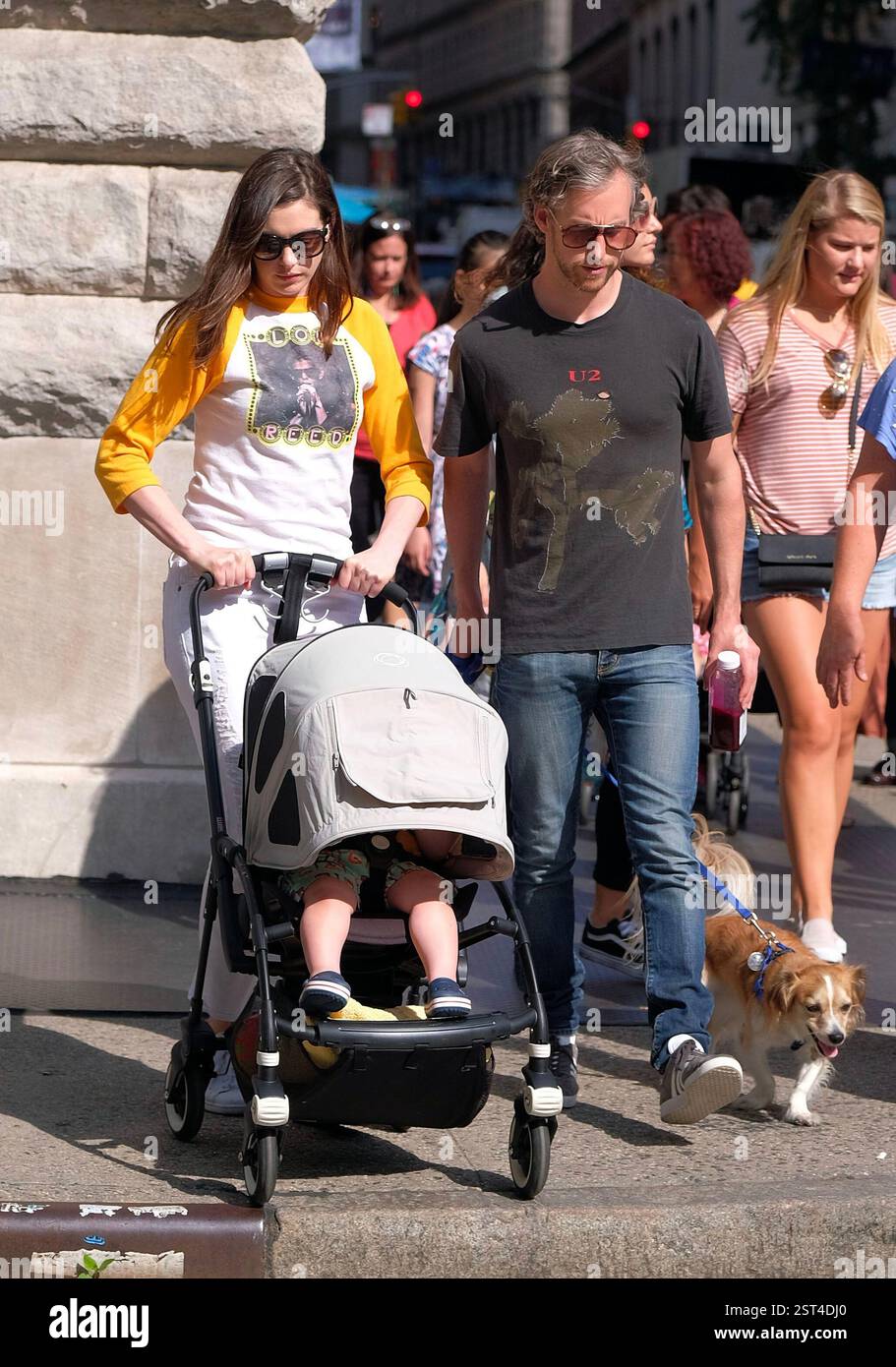 Actress Anne Hathaway walks in Soho with her husband Adam Shulman and ...