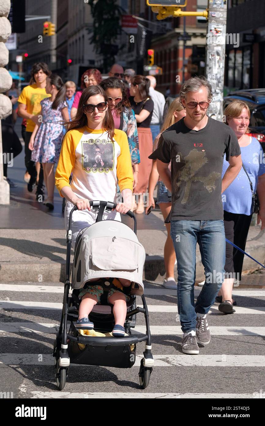 Actress Anne Hathaway walks in Soho with her husband Adam Shulman and ...