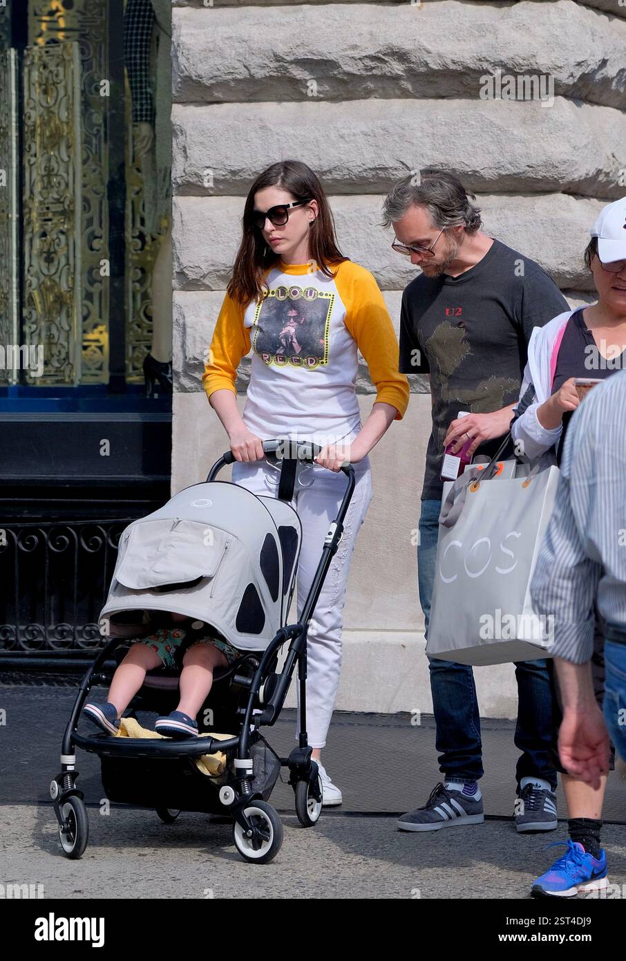 Actress Anne Hathaway walks in Soho with her husband Adam Shulman and ...