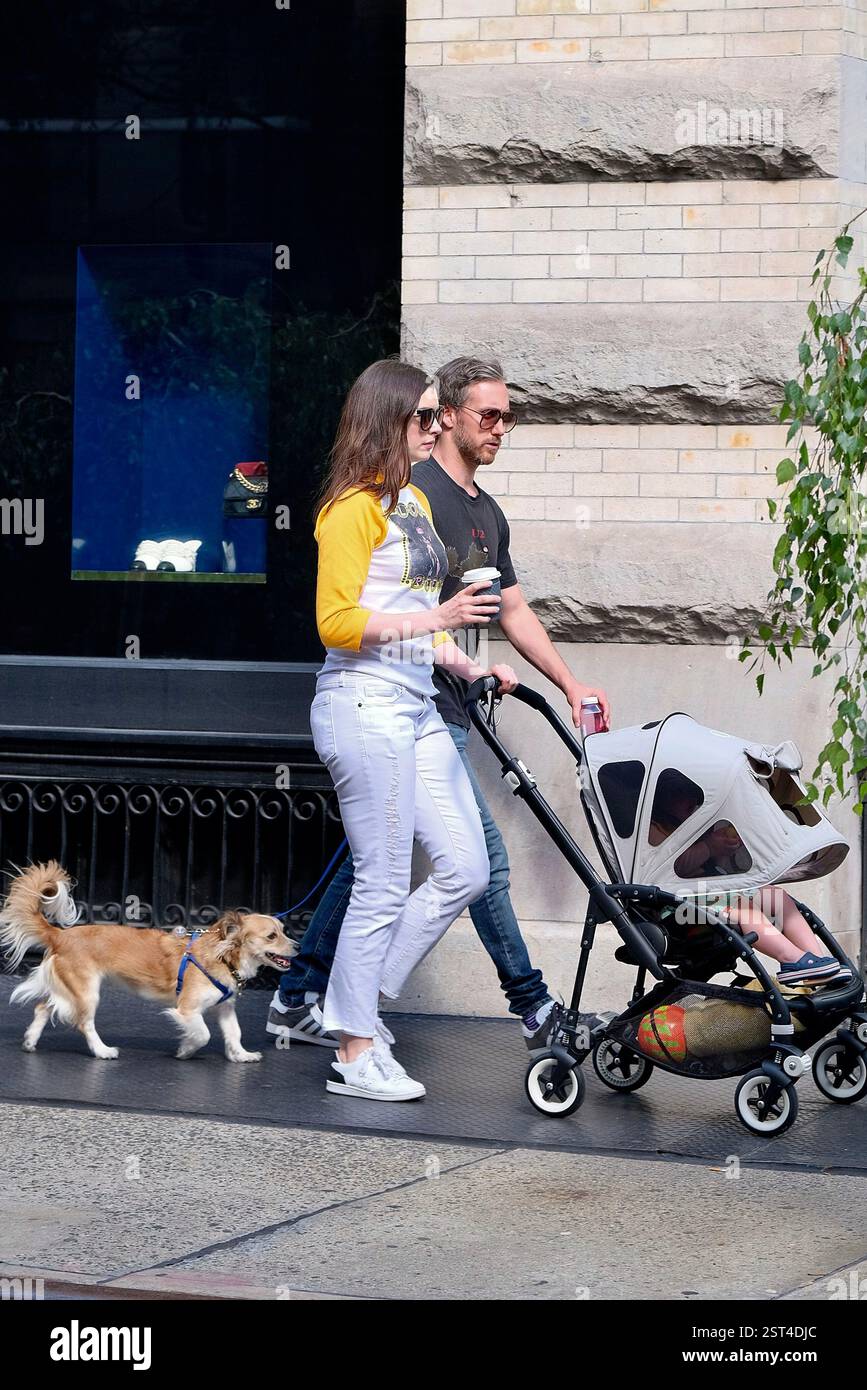 Actress Anne Hathaway walks in Soho with her husband Adam Shulman and ...
