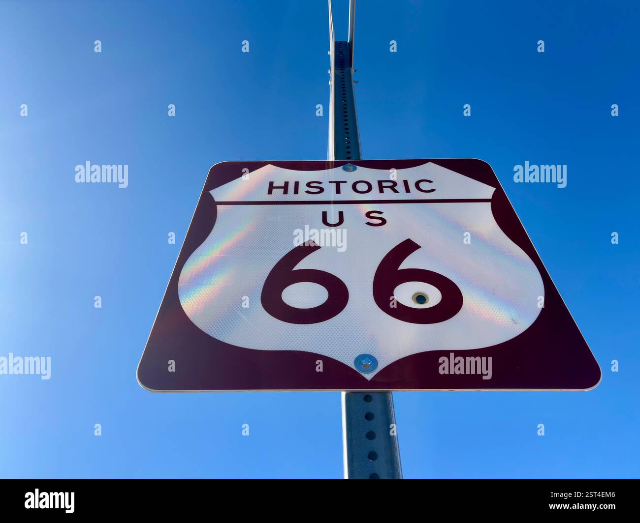 Historic Route 66 road sign against a clear blue sky in Arizona Stock ...