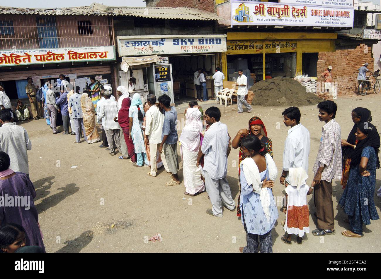 Standing waiting in line indian man hi-res stock photography and images ...