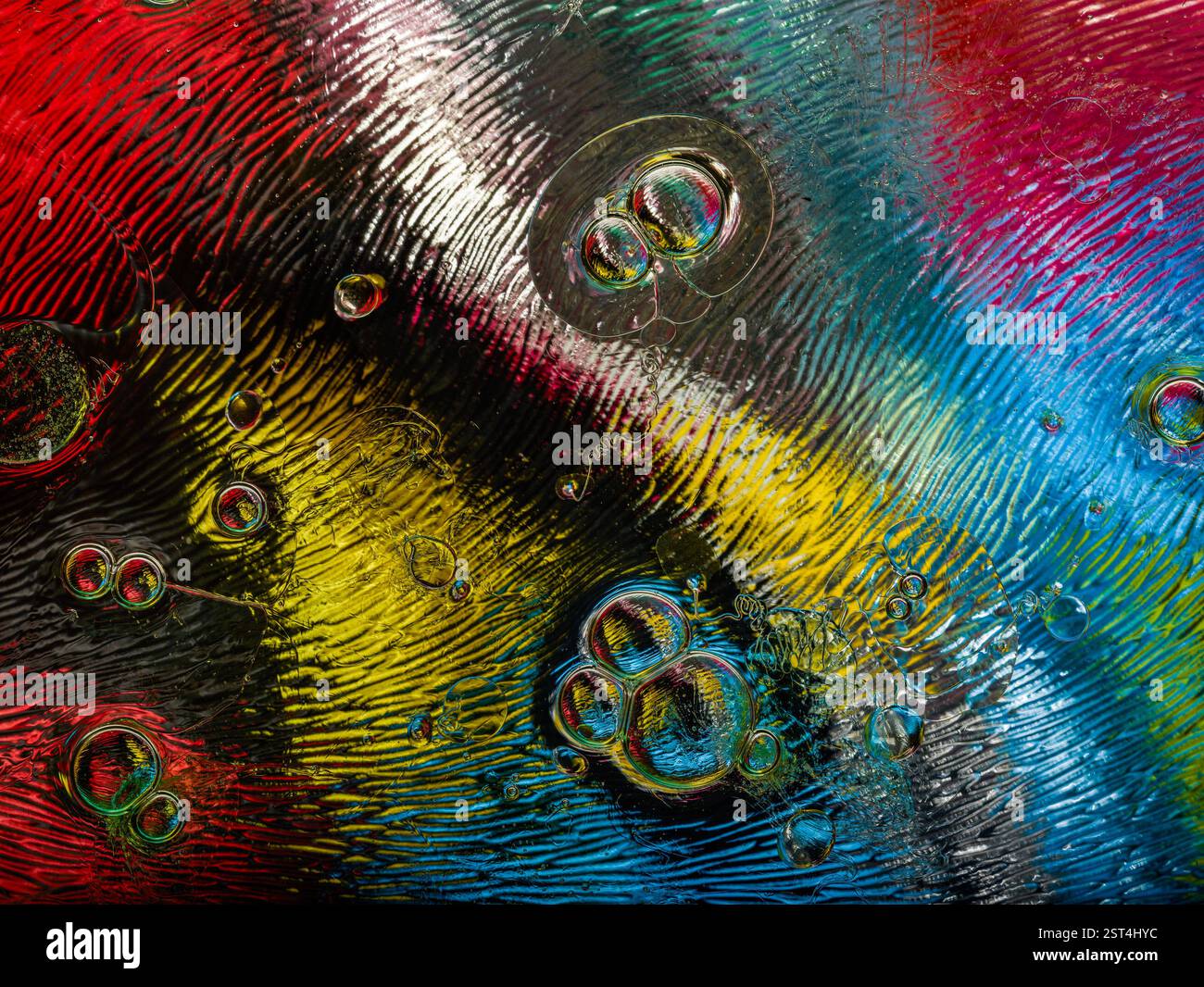 Very close up arresting, ethereal, colour infused refraction in water ...