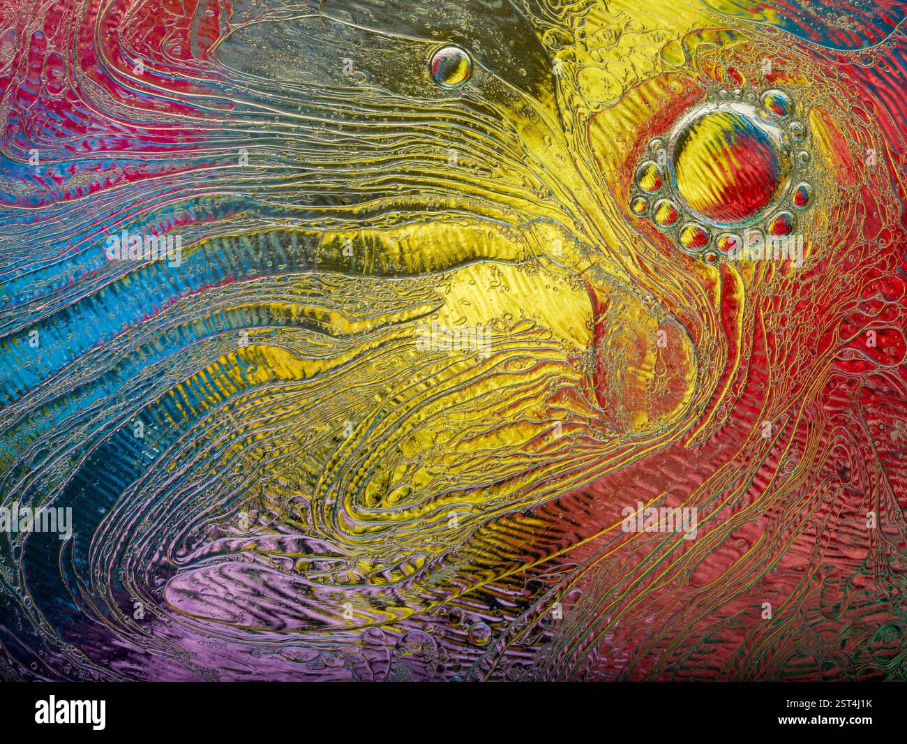 Very close up arresting, ethereal, colour infused refraction in water ...