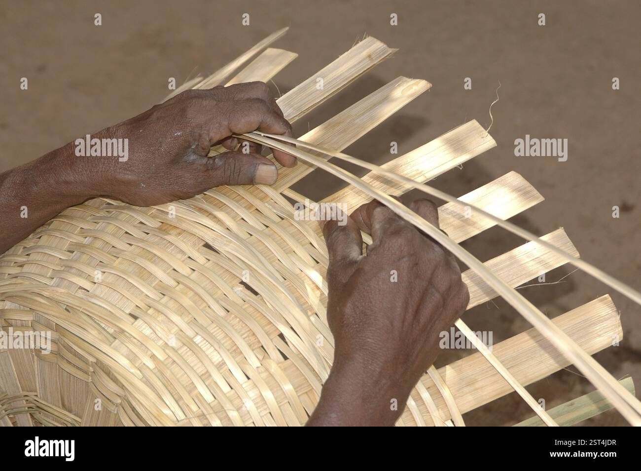 Close up of Close up of hand making basket of cane, Bamboo Basket maker ...