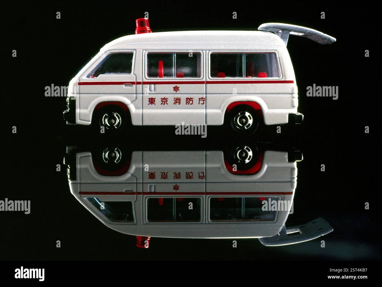 Toy ambulance with reflection Stock Photo - Alamy