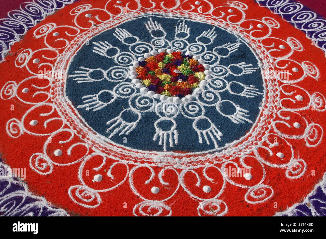 Rangoli, Indian art of drawing with colors, Design drawn on the ground ...