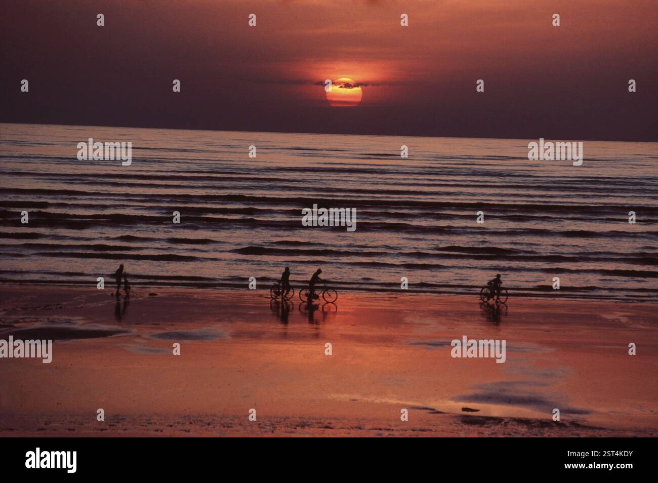 Sunset at beach, Tithal, india Stock Photo - Alamy