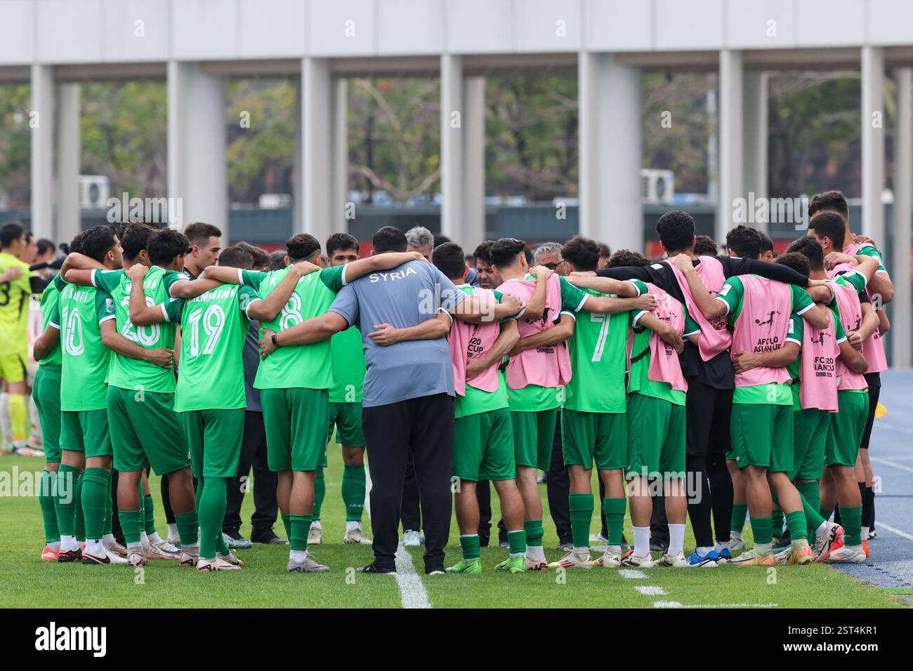 Shenzhen. 17th Feb, 2025. Players of Syria gather together before a ...