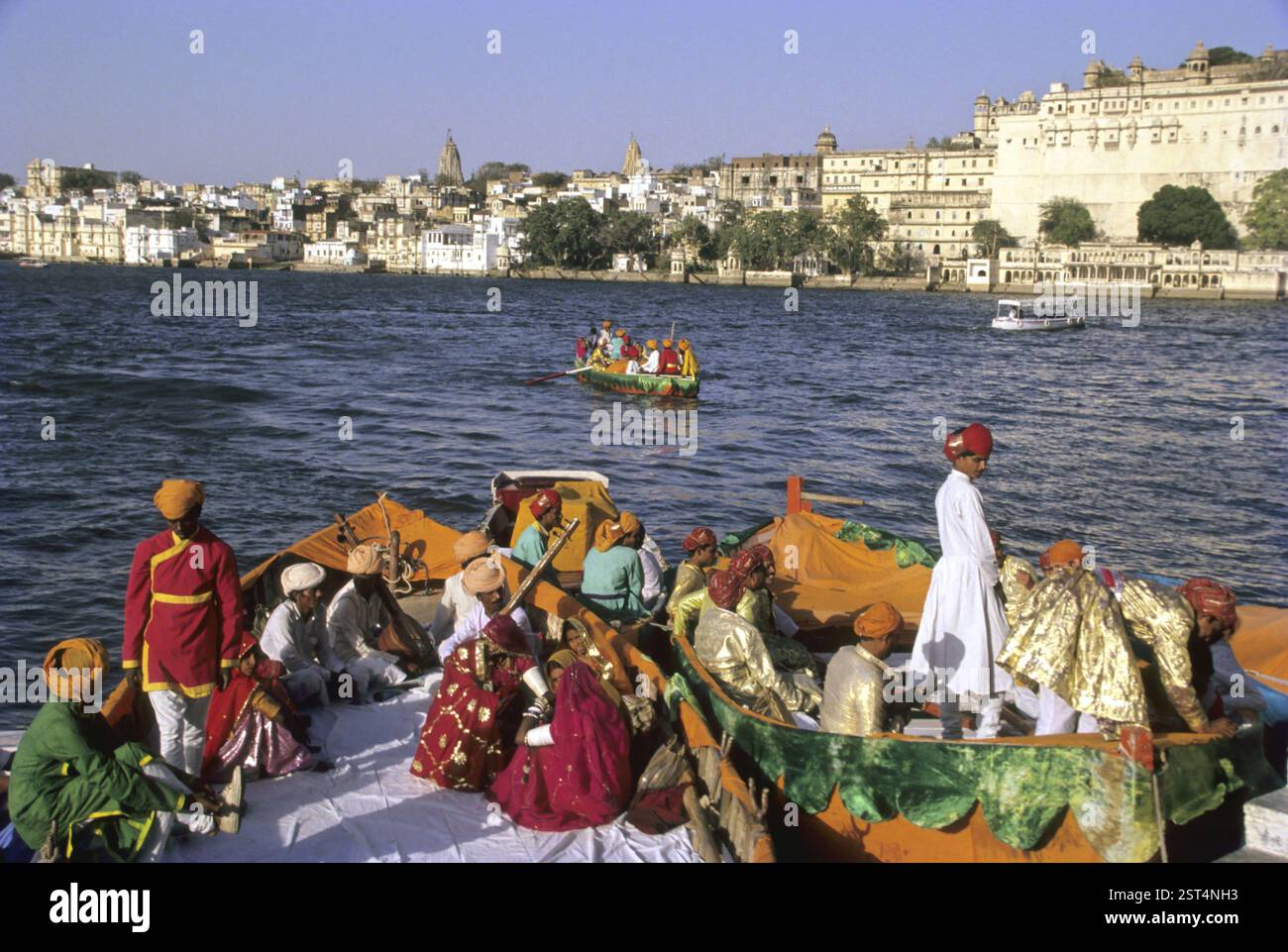Peoples in boat in mewar festival udaipur at rajasthan India, Asia ...
