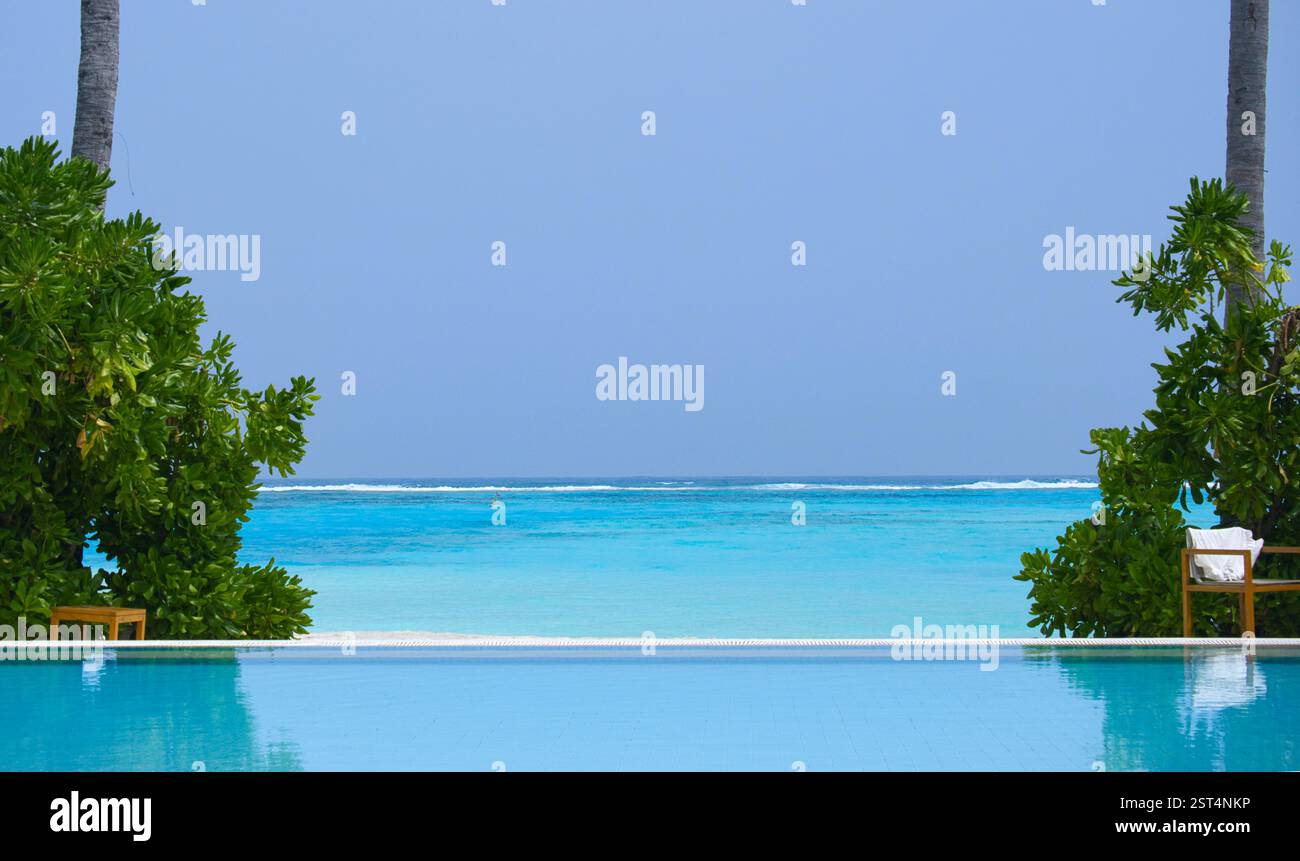 Infinity pool in a resort,Maldives Stock Photo - Alamy