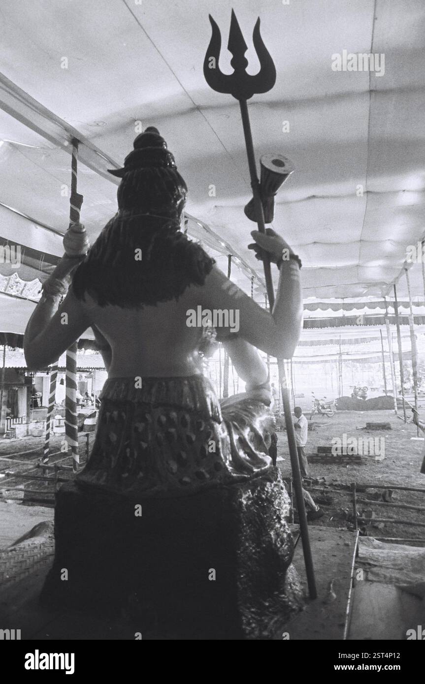 Lord Shiv idol trident in hand being installed for religious function ...