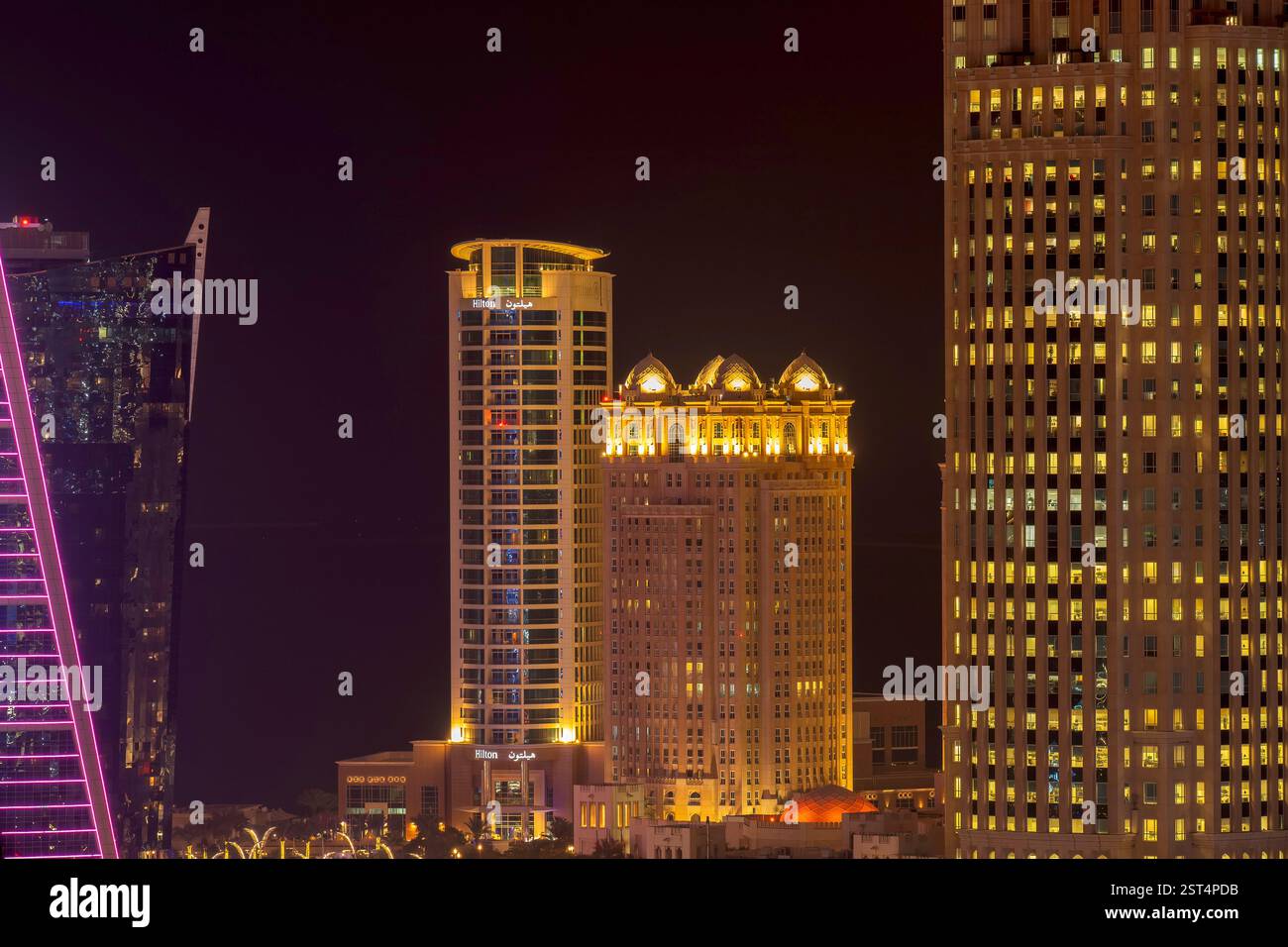 Hilton Doha with falcon tower Doha corniche Qatar Stock Photo - Alamy