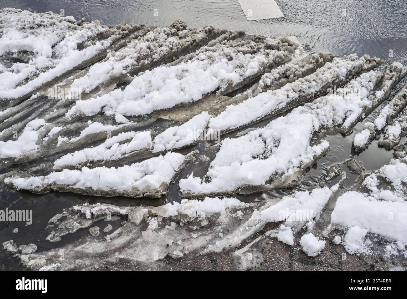 Snow and slush, street in Berlin, Germany, Europe Stock Photo - Alamy