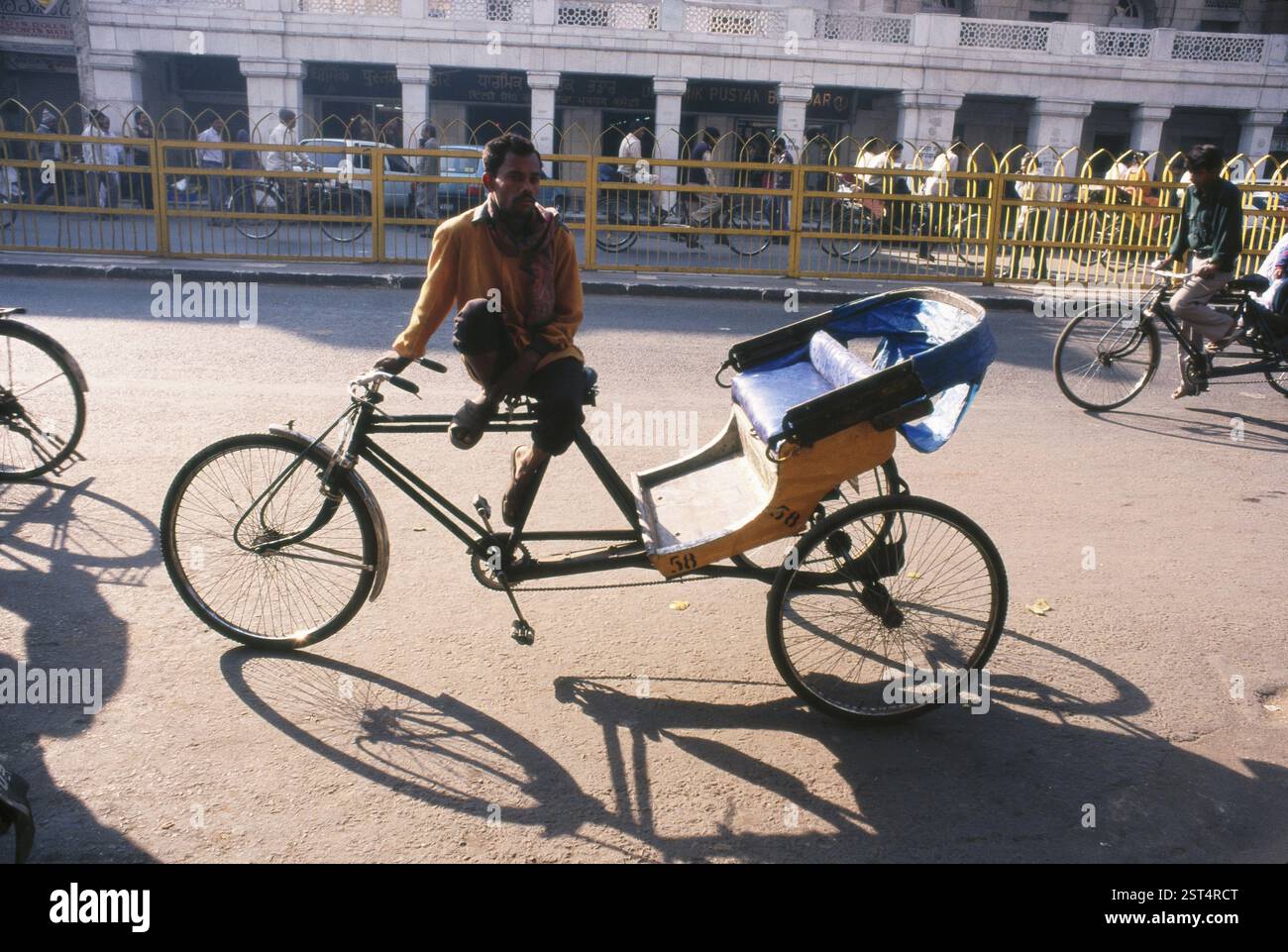 Cycle rickshaw parked on road, delhi, india Stock Photo - Alamy