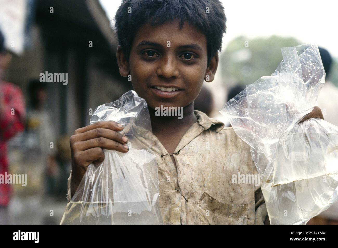 Child holding sac hi-res stock photography and images - Alamy