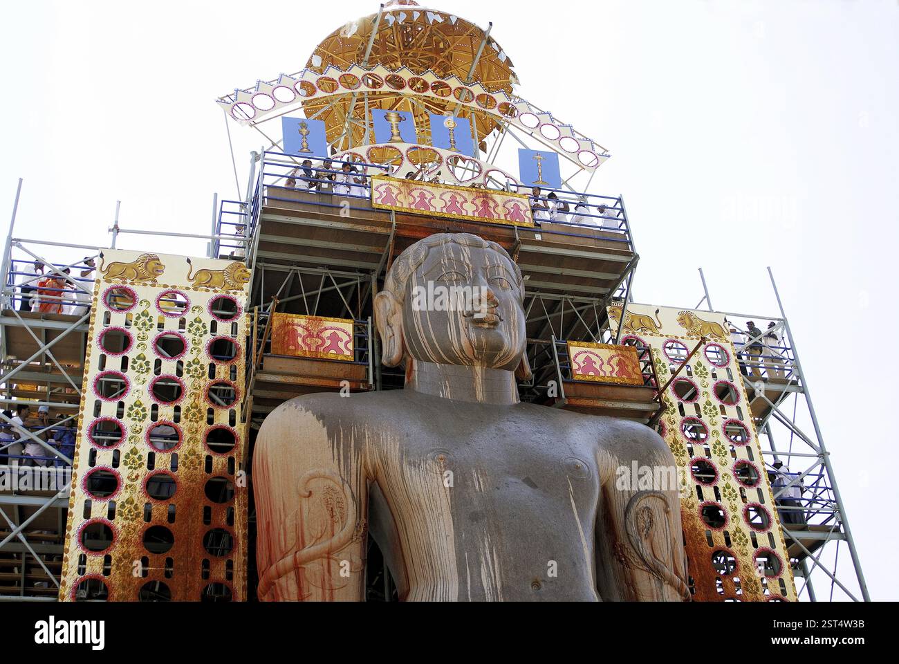 Jain Devotees pouring Vermillion Water on the head of 58.8 feet ...