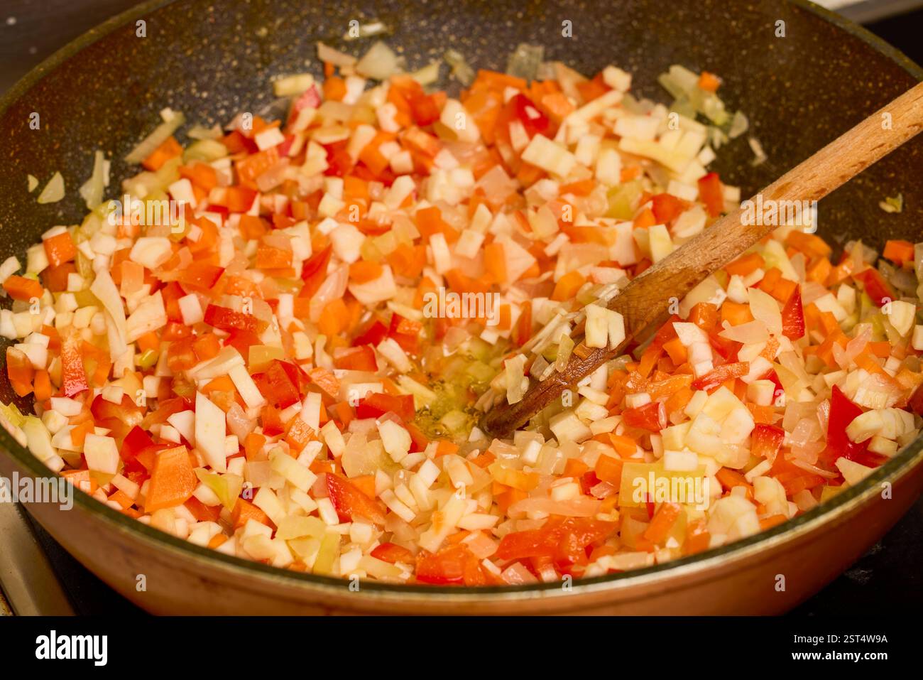 mixed vegetables cut into small cubes in a wok Stock Photo - Alamy