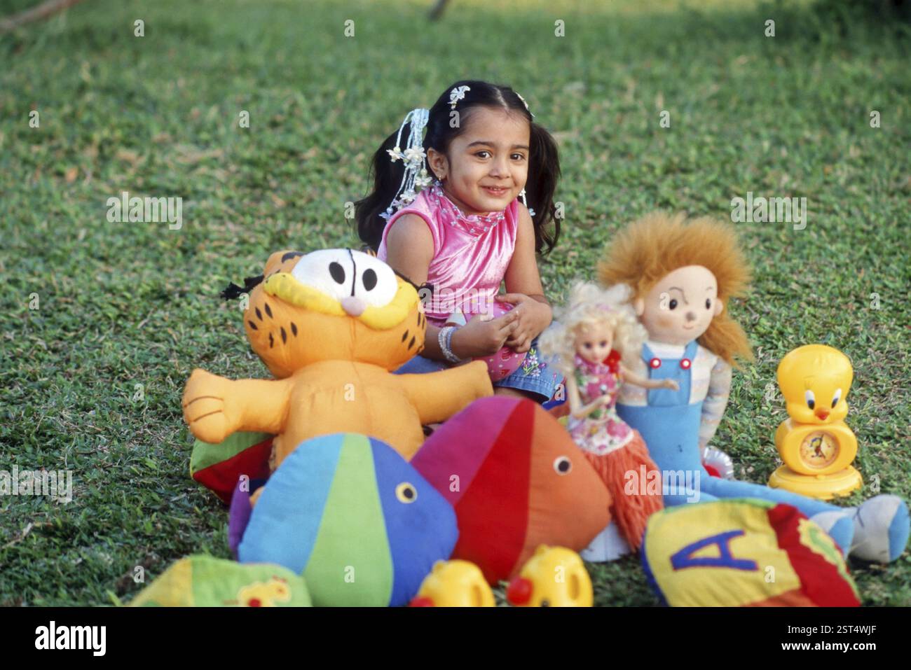 Two children playing dolls hi-res stock photography and images - Alamy