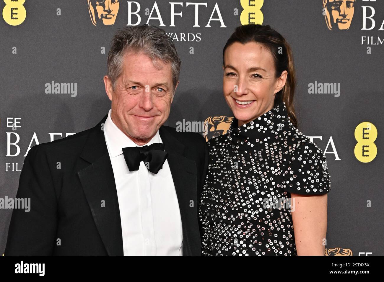 Hugh Grant and Anna Elisabet Eberstein attends the 2025 EE BAFTA Film ...